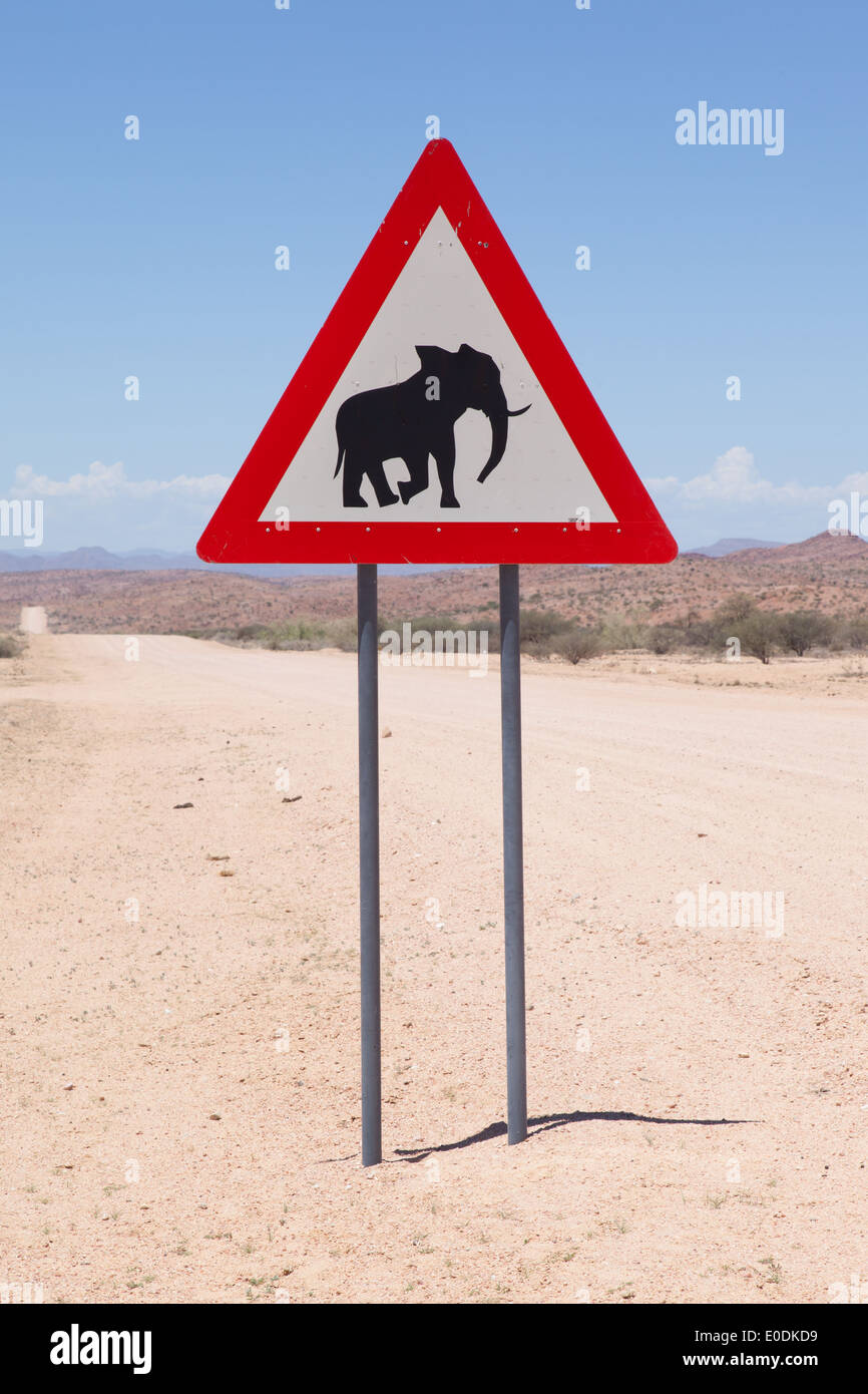 Caution: Elephants! Road sign standing beside road, Namibia, Africa ...