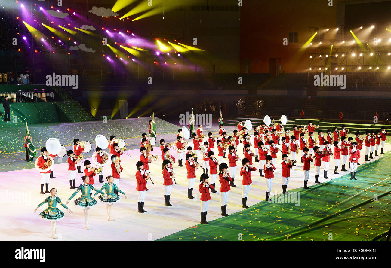 Beijing, China. 9th May, 2014. Members of a youth wind band perform at ...