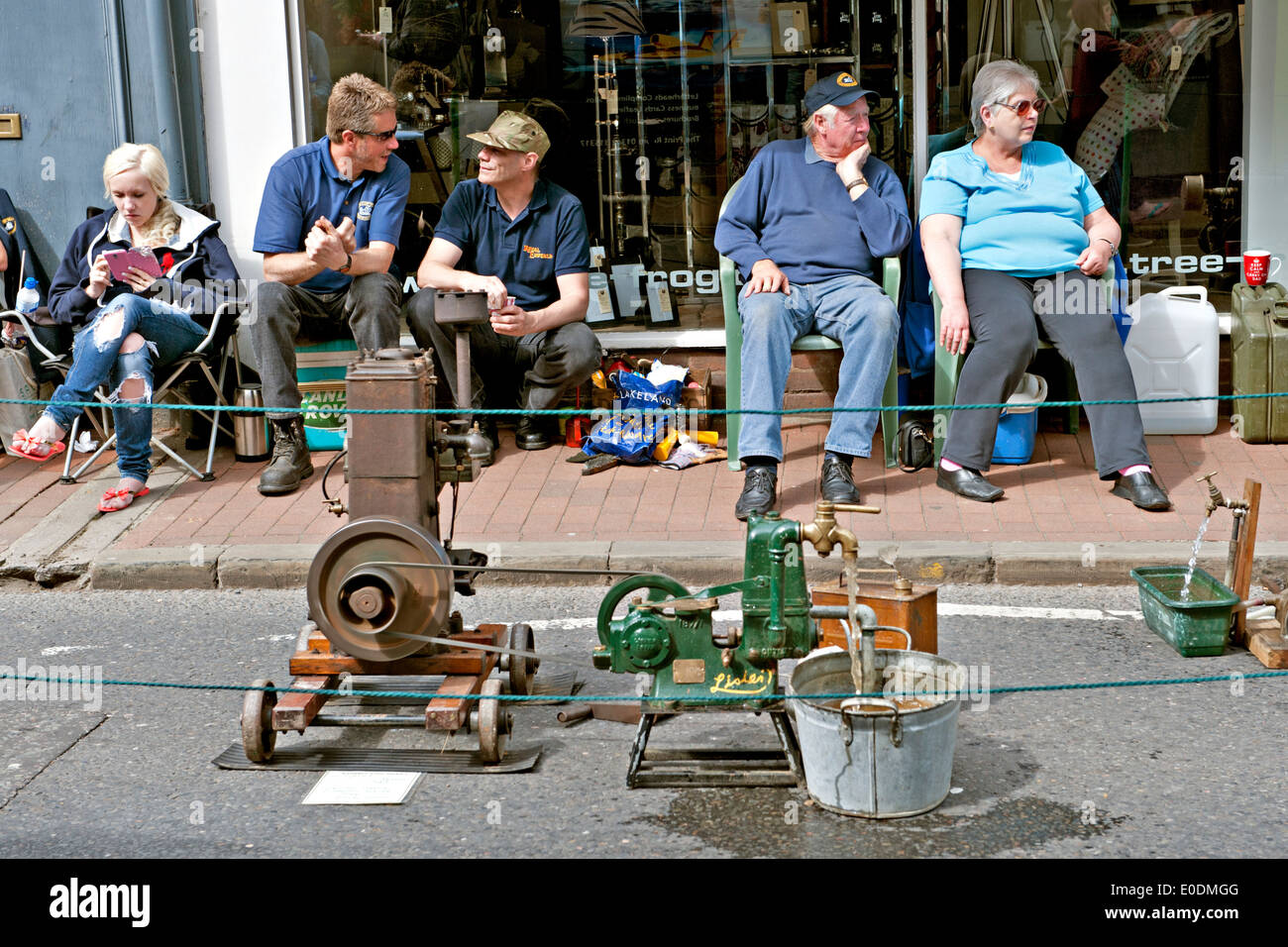 Stationary engine enthusiasts display their machines at a town fair ...
