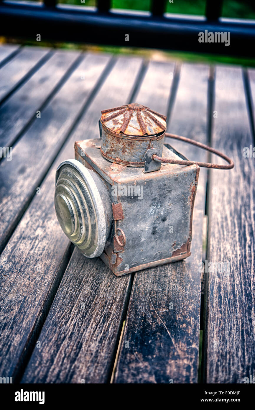 Vintage torch on old wood floor texture Stock Photo - Alamy