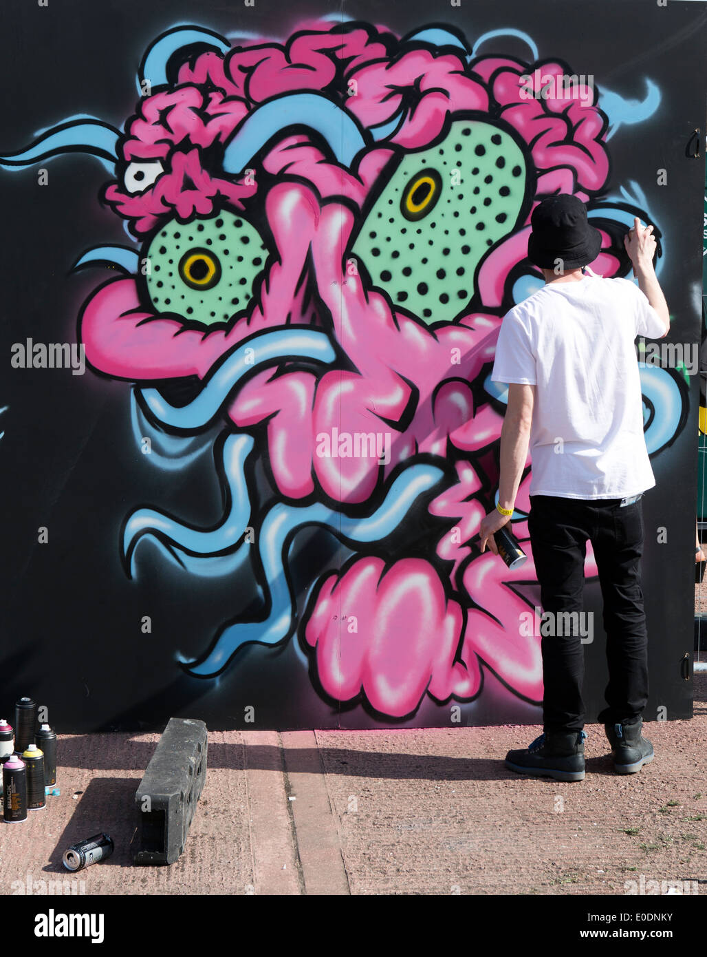 Street artist painting at Streetfest a one day urban culture festival ...
