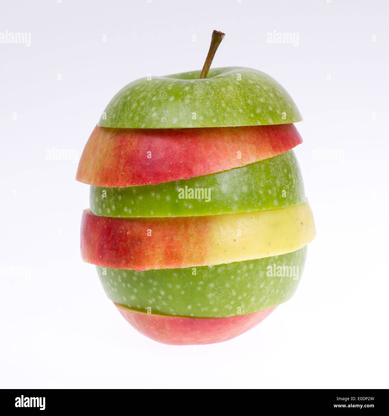 A sliced green and red apple isolated on a grey background Stock Photo ...