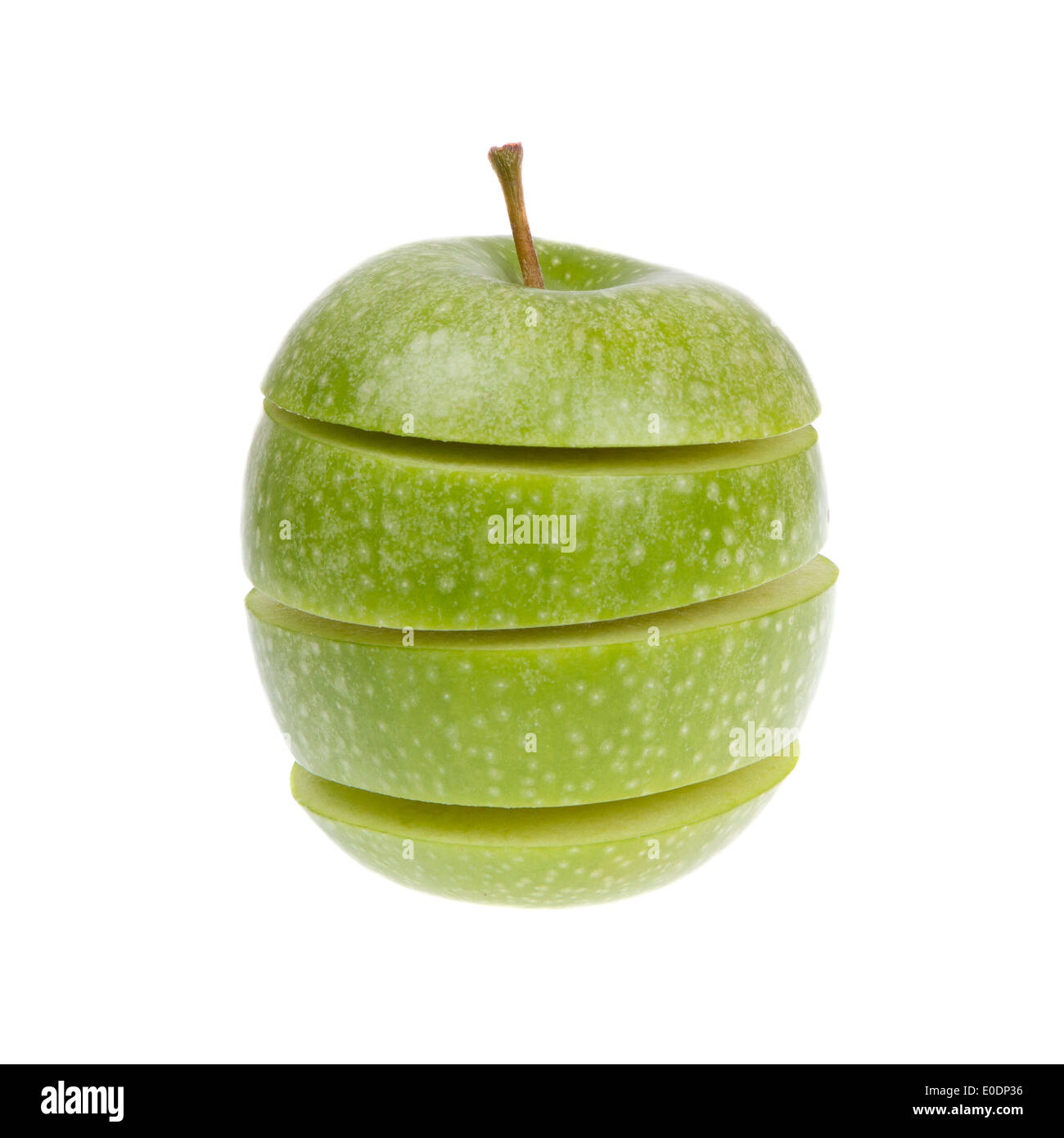 A sliced green apple isolated on a white background Stock Photo - Alamy