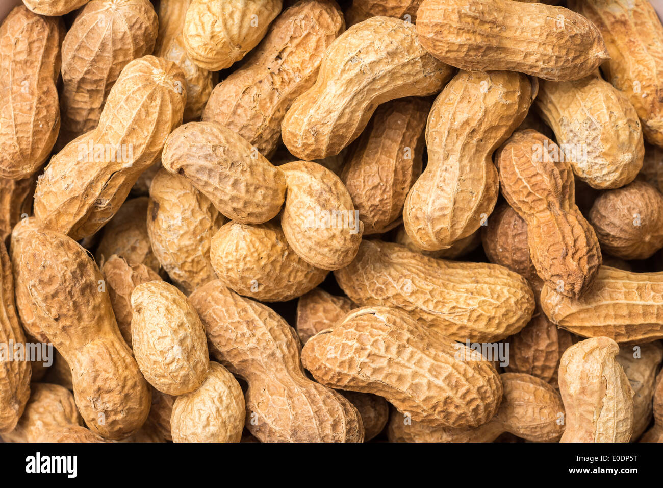 Pile Of Peanuts Close Up Stock Photo - Alamy