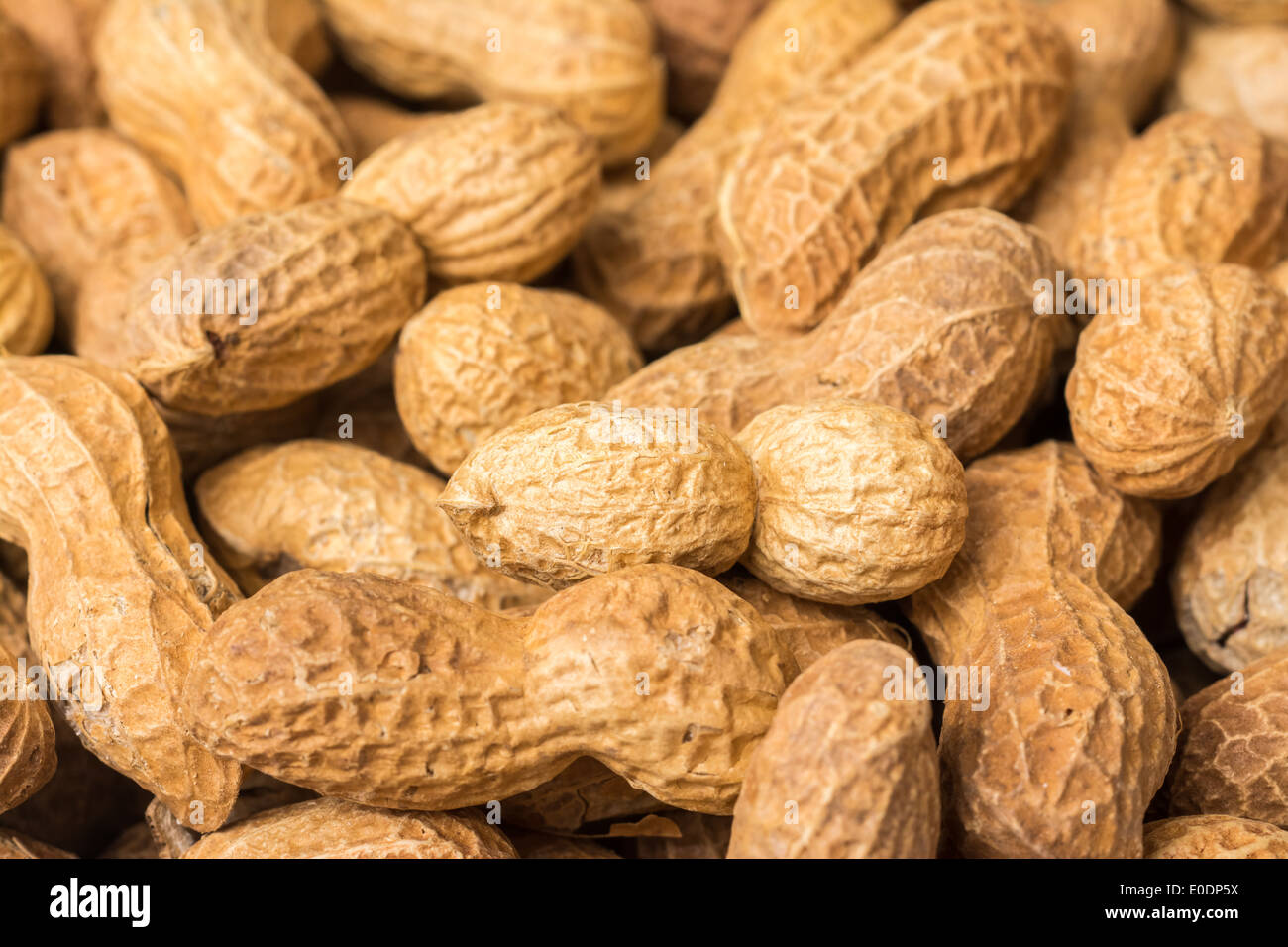 Pile Of Peanuts Close Up Stock Photo - Alamy