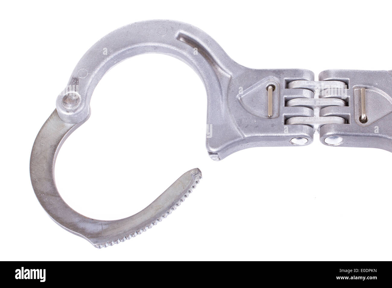 A close-up of metal handcuffs isolated on a white background Stock ...