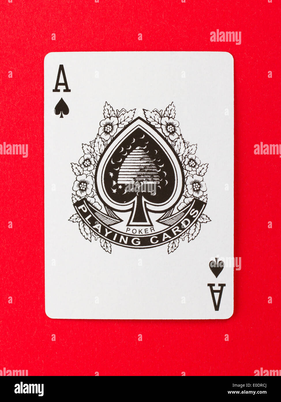 Playing card (ace) isolated on a red background Stock Photo - Alamy
