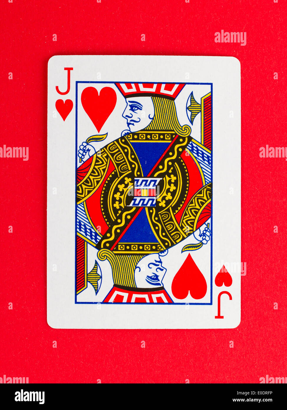 Playing card (jack) isolated on a red background Stock Photo - Alamy