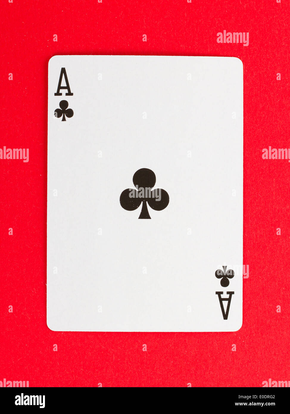 Old playing card (ace) isolated on a red background Stock Photo - Alamy