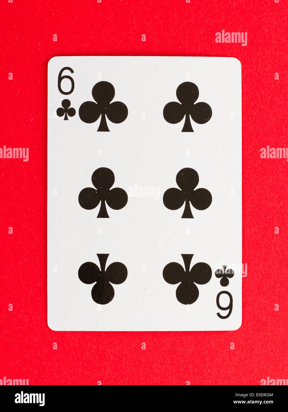 Old playing card (six) isolated on a red background Stock Photo - Alamy