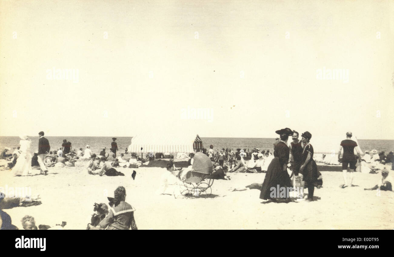 A photograph of a crowd at Jetties Beach, captured around the 1900s ...