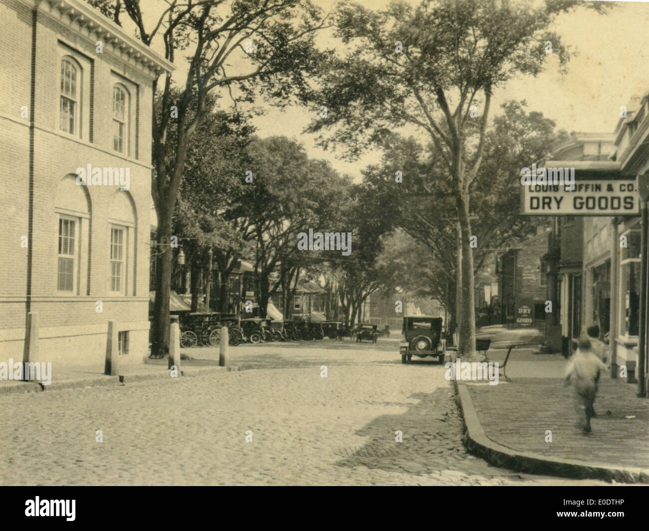 This photograph depicts Coffin's Dry Goods store, an early 20th-century ...