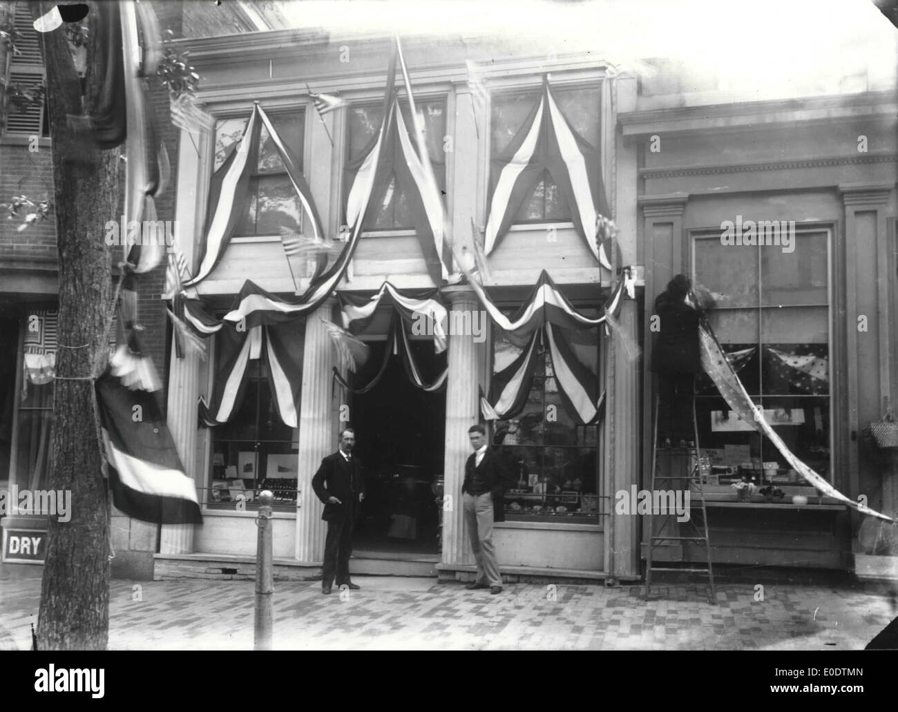 A historical image of a dry goods store, showcasing the interior with ...