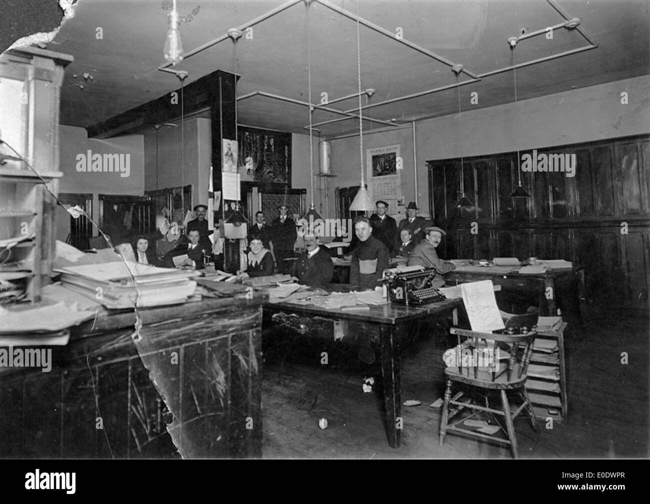 An office interior scene, showing desks and an office environment ...