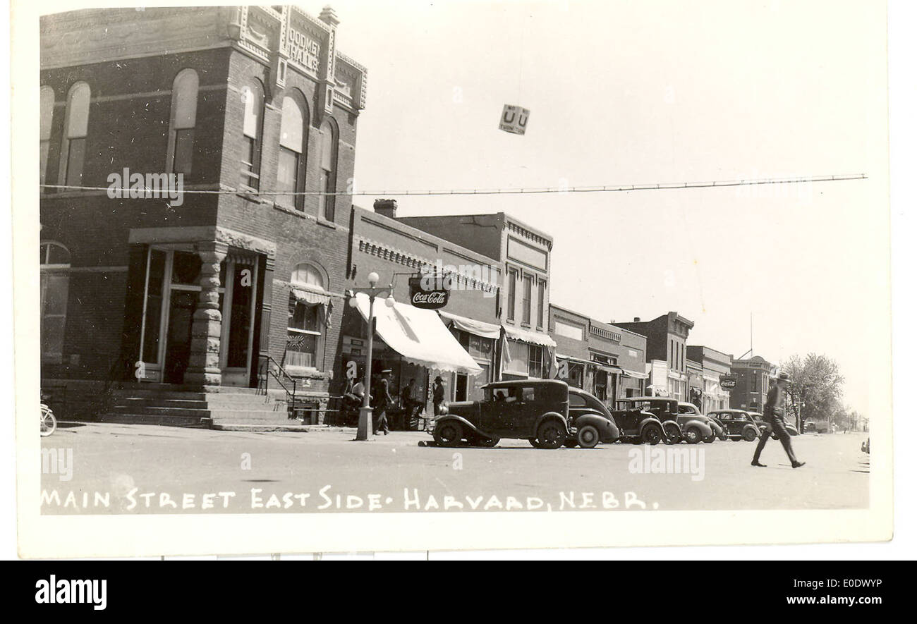 This image captures Main Street in Harvard, Nebraska, in 1944, during ...