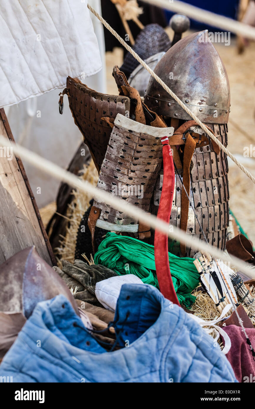 medieval shields, helm and weapons in a medieval fair in italy Stock ...