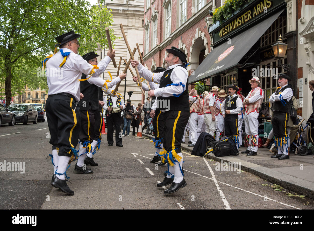 London, UK. 10th May, 2014. Morris Men dance outside the Westminster ...