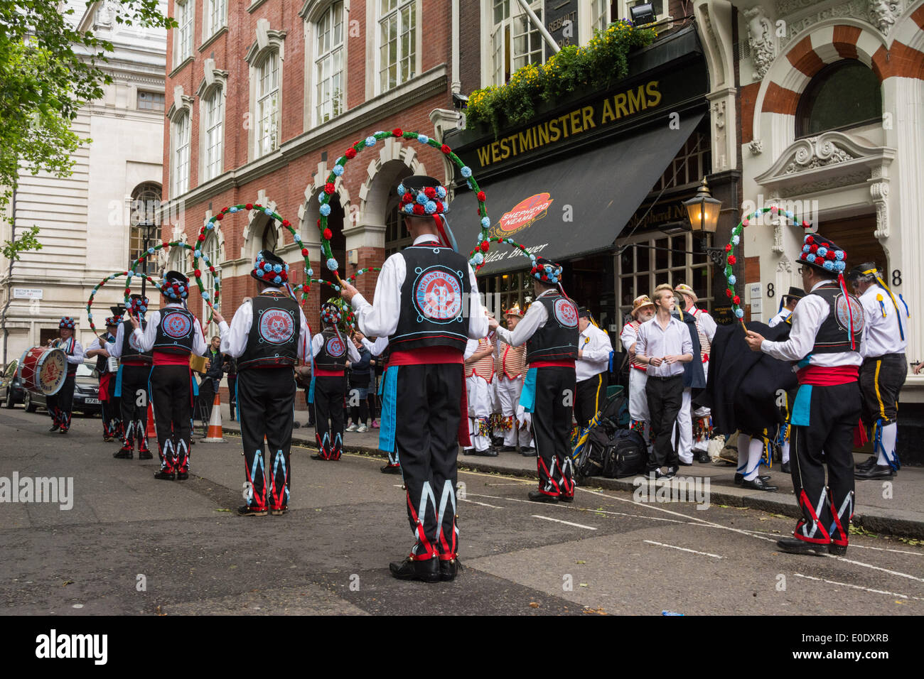 London, UK. 10th May, 2014. Morris Men dance outside the Westminster ...