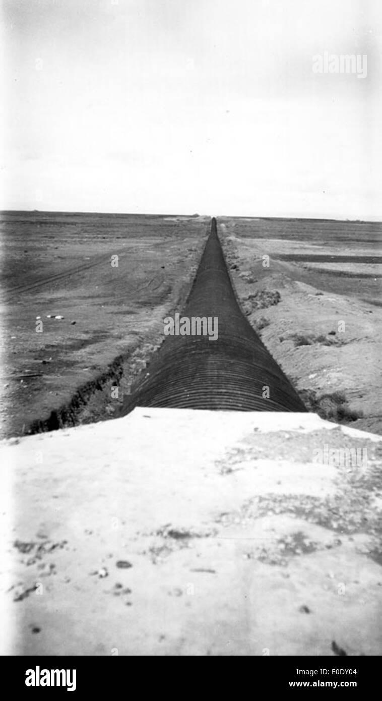 A photograph showing an irrigation flume, a key component in water ...