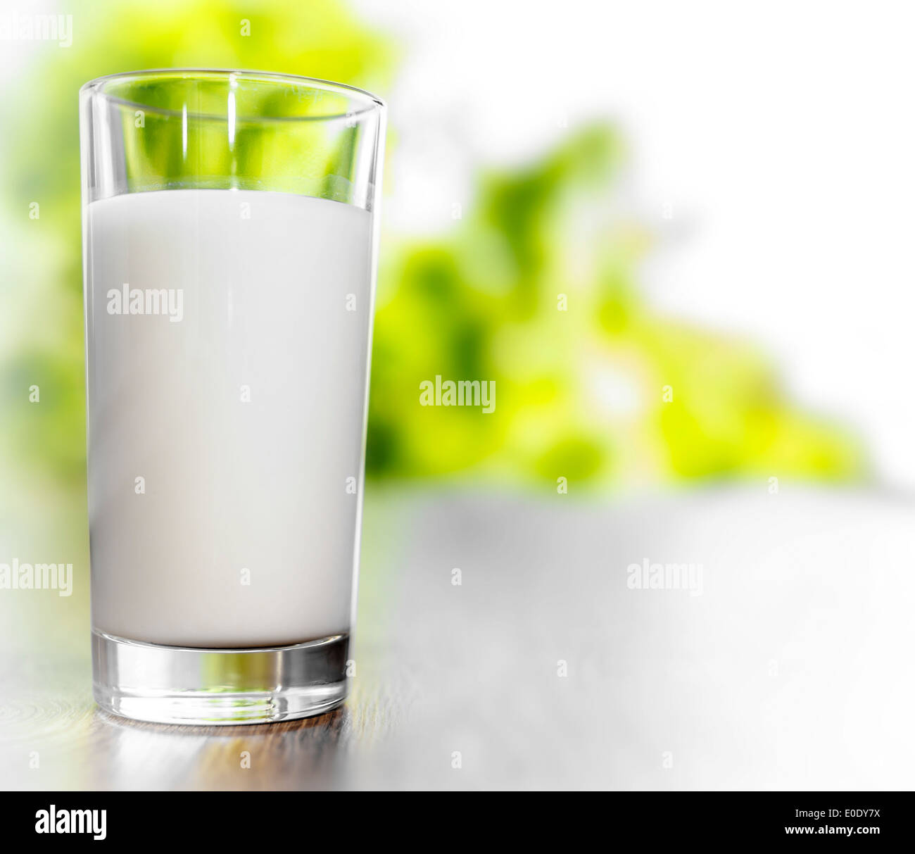 Glass milk green background hi-res stock photography and images - Alamy