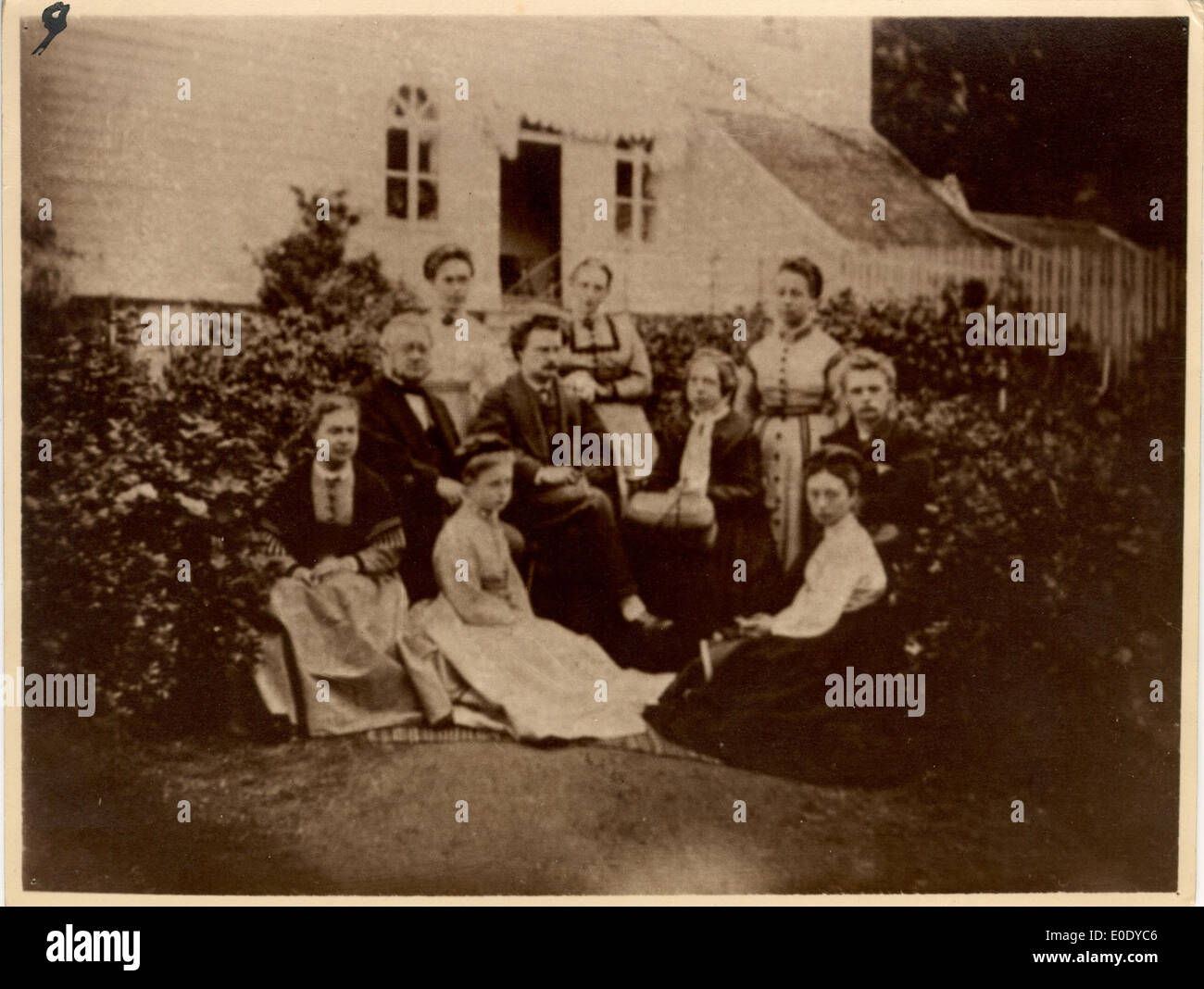 A photograph of a garden party hosted by the Grieg family, capturing a ...