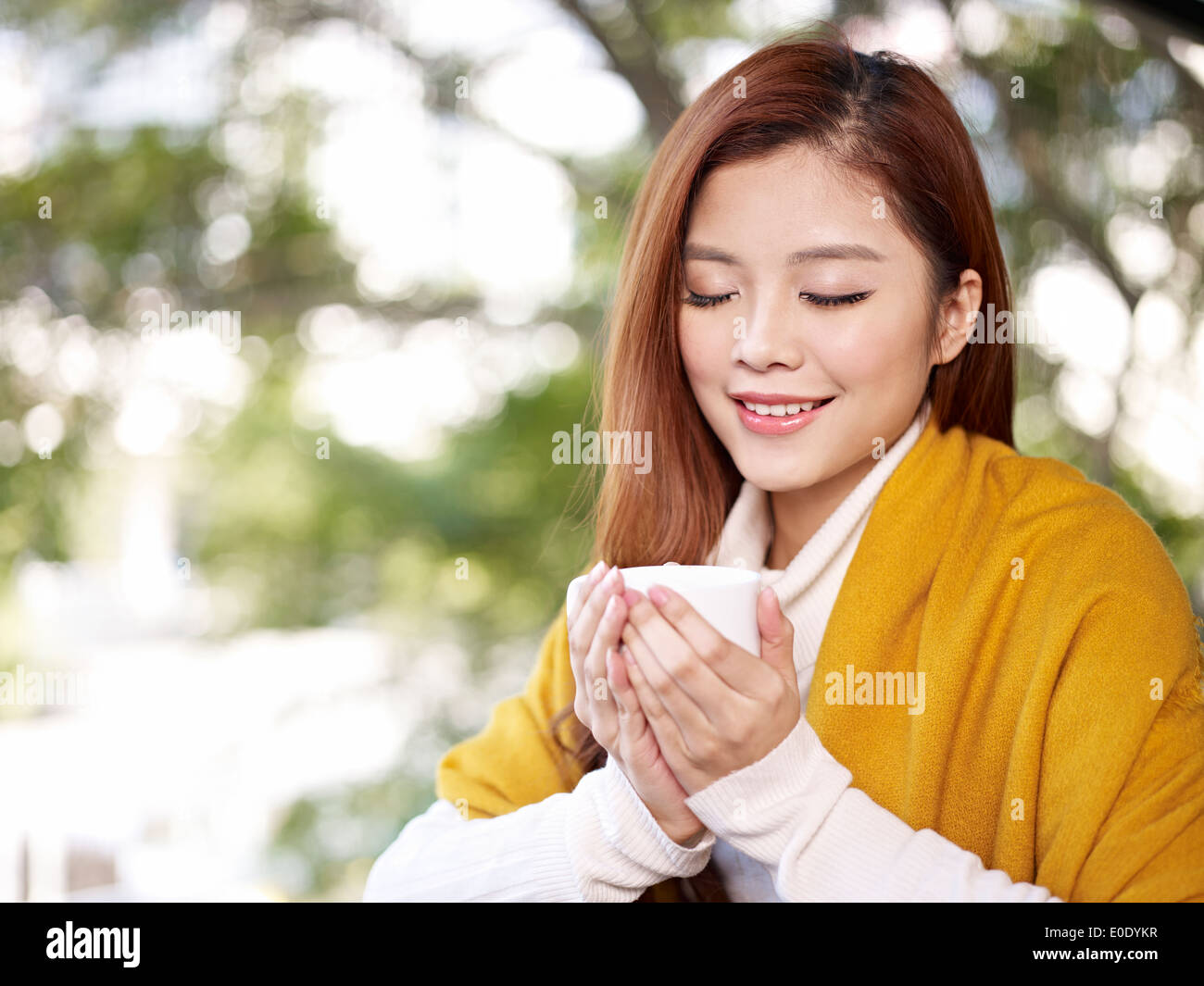 woman enjoying coffee Stock Photo - Alamy