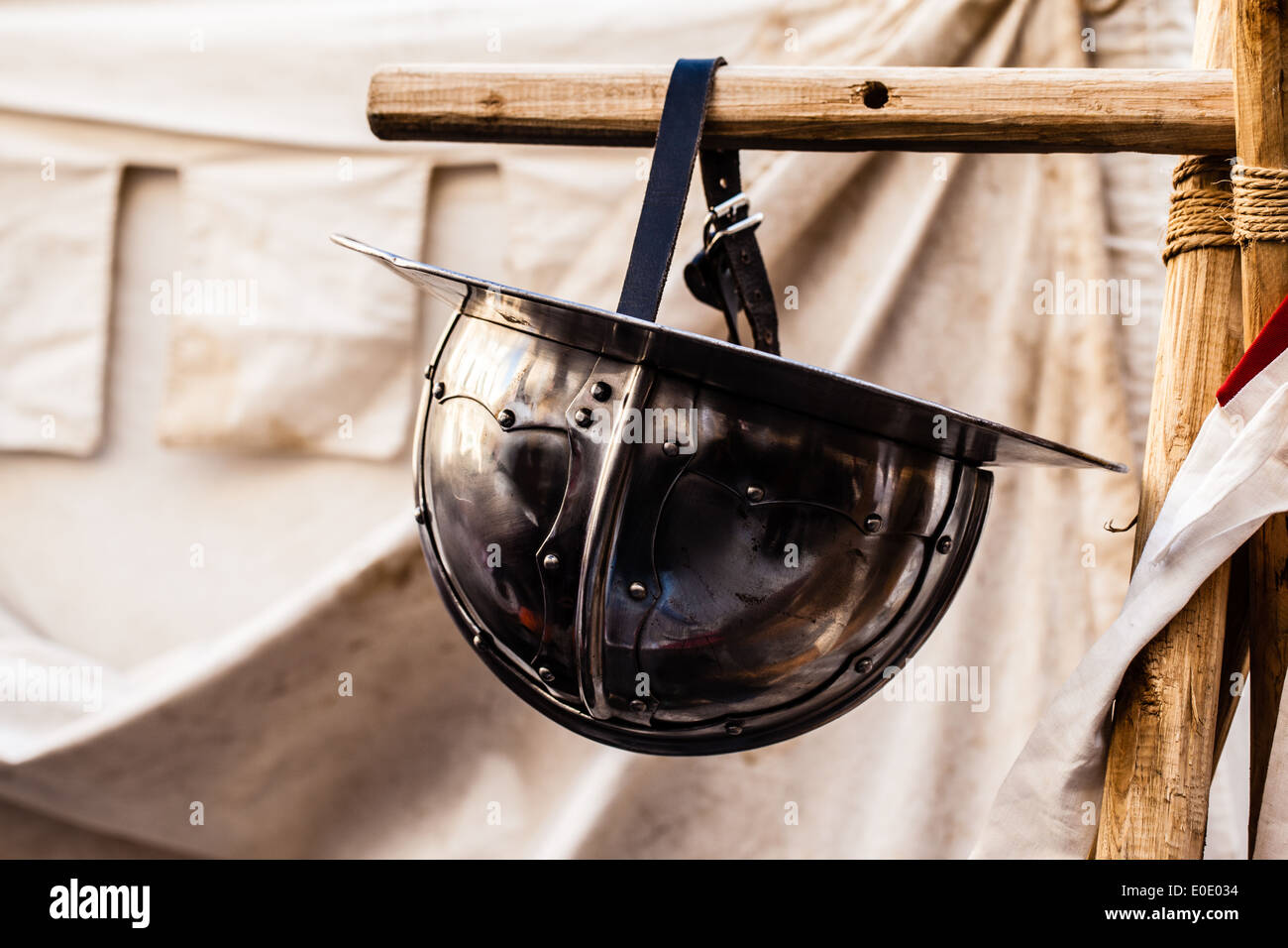 medieval shields, helm and weapons in a medieval fair in italy Stock ...