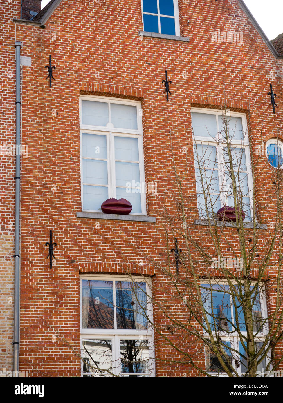 Faces in windows hi-res stock photography and images - Alamy