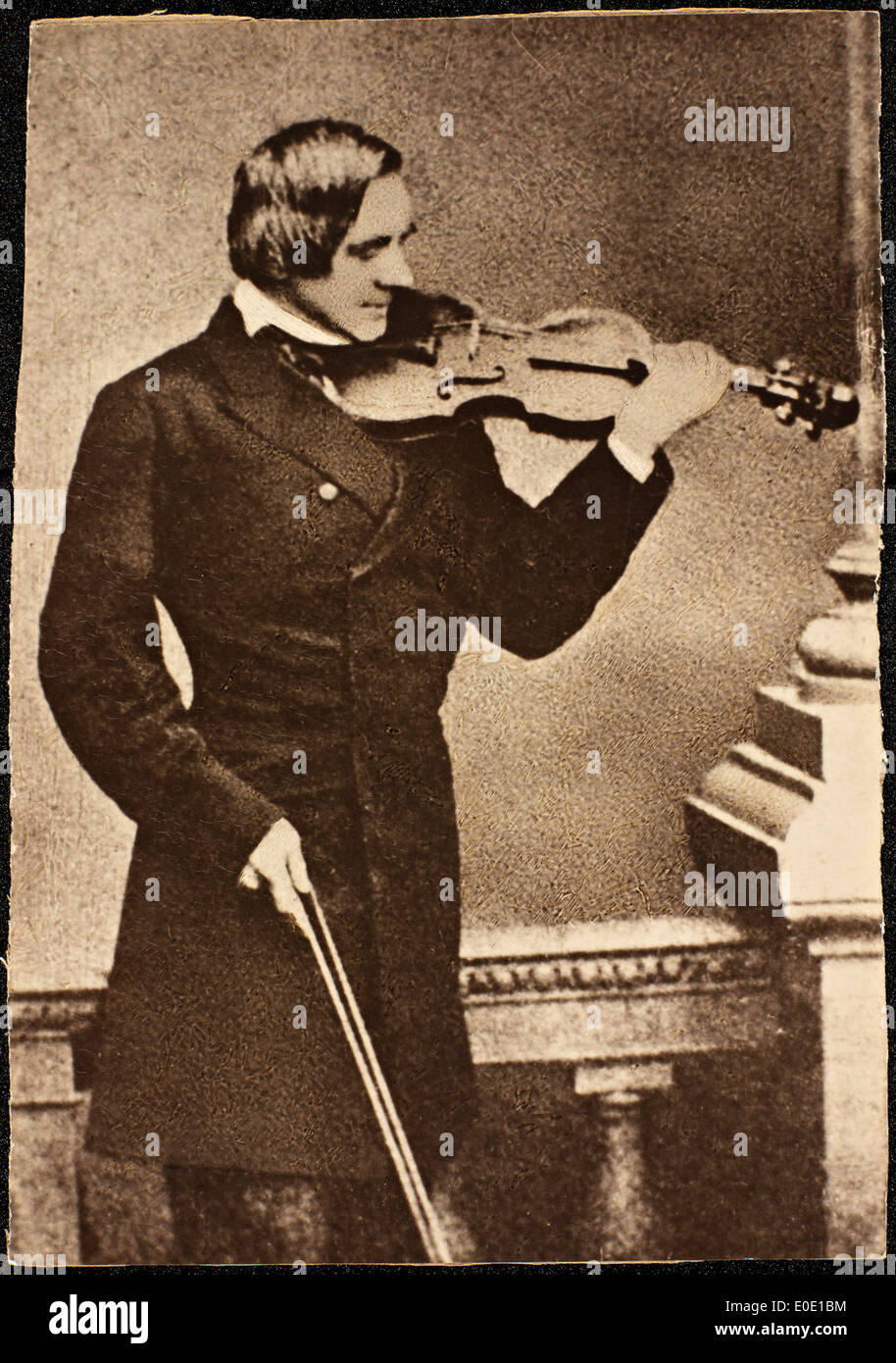 A portrait of the renowned Norwegian violinist, Ole Bull, holding his ...