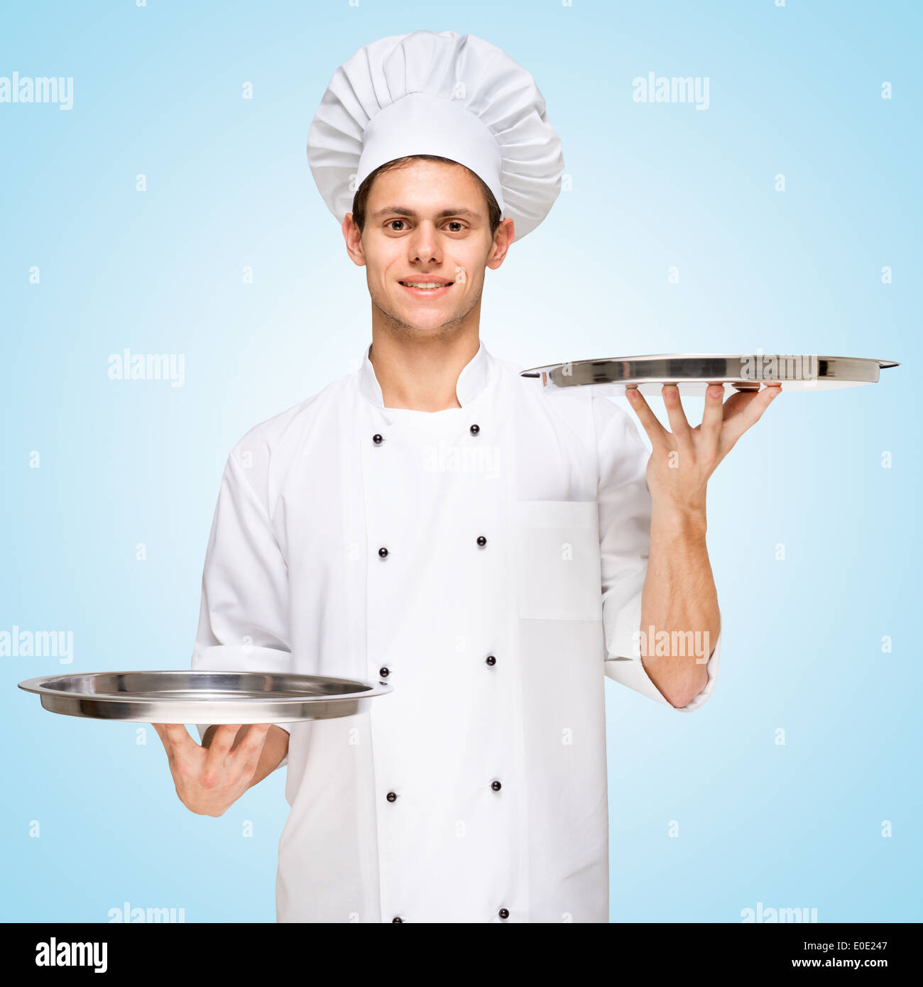 Restaurant chef serving a copy space for menu with prices on a tray ...
