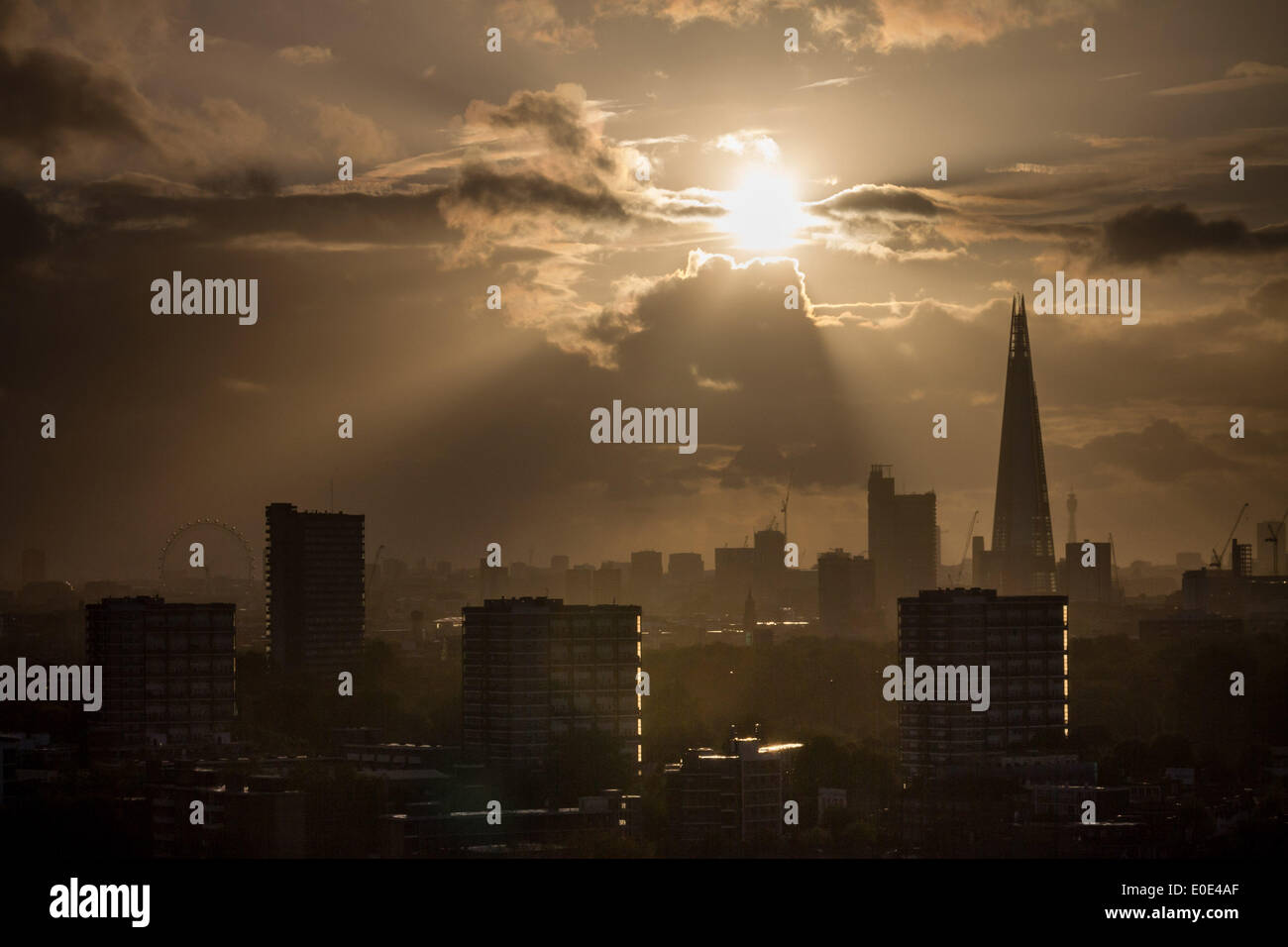 Both The Shard building and The London Eye are dramatically lit with ...