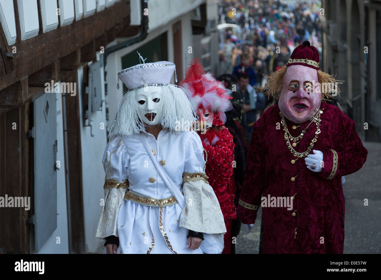 A photograph of some parade participants dressed as a married couple at ...