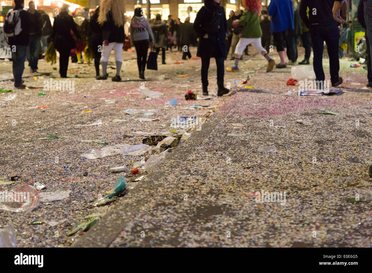 Rubbish littering the ground after a carnival in Europe. Pollution has ...