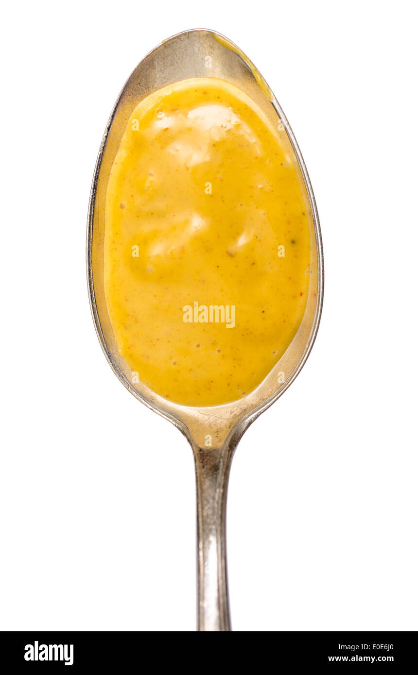 Spoon with spicy curry sauce in vertical format Stock Photo - Alamy