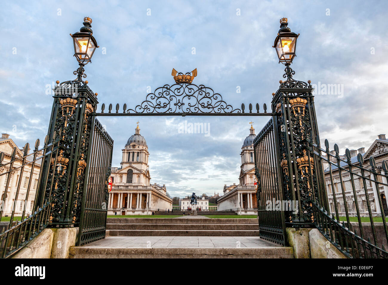 Old Royal Naval College entrance with ornate gates and lamps ...
