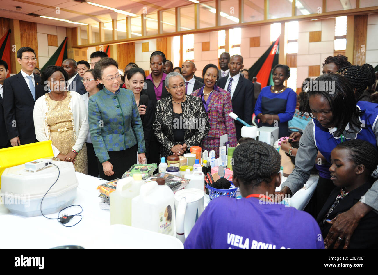 Nairobi, Kenya. 10th May, 2014. Cheng Hong (L front), wife of Chinese ...