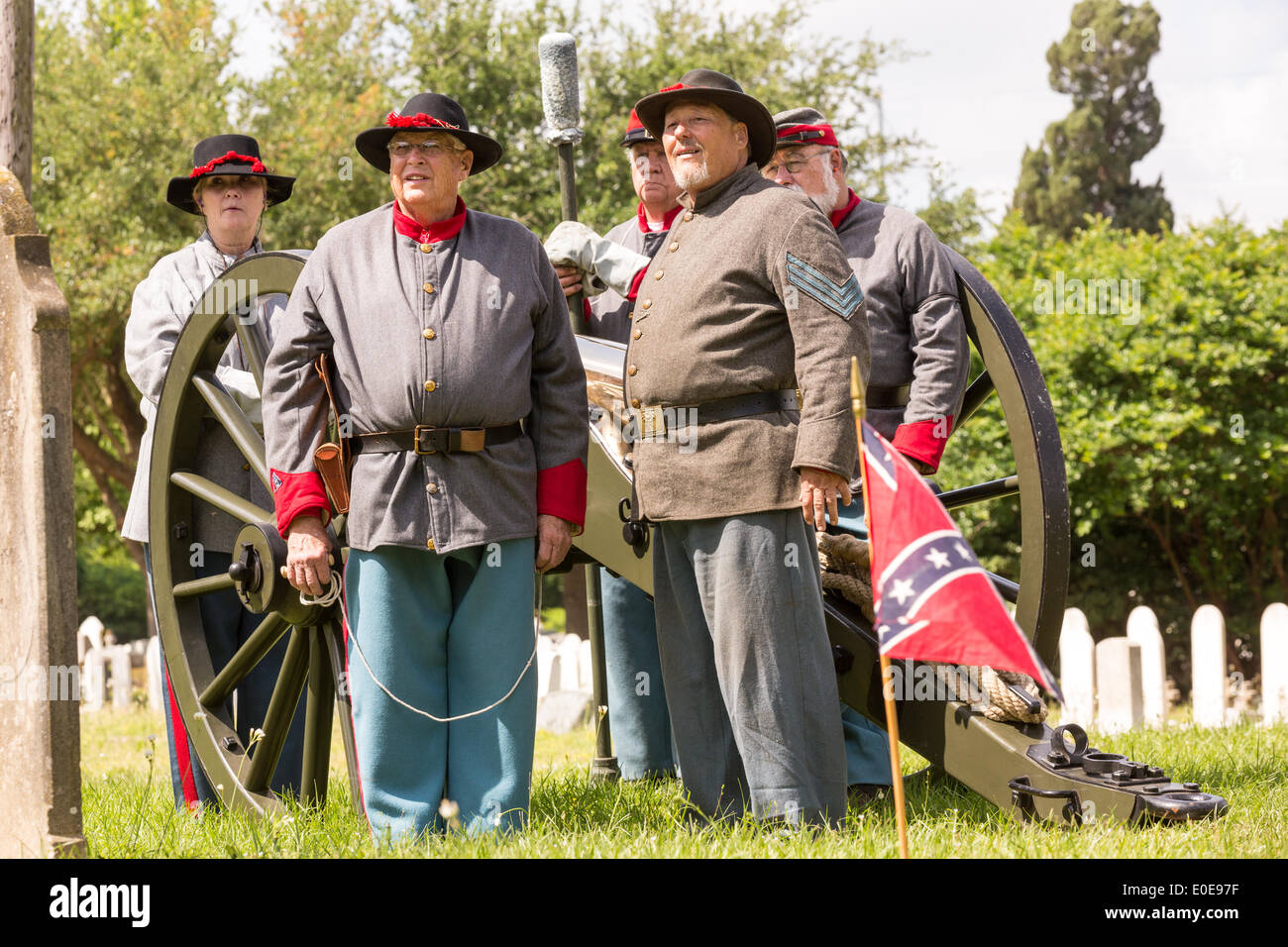 Civil War re-enactors stand by a canon during Confederate Memorial Day ...