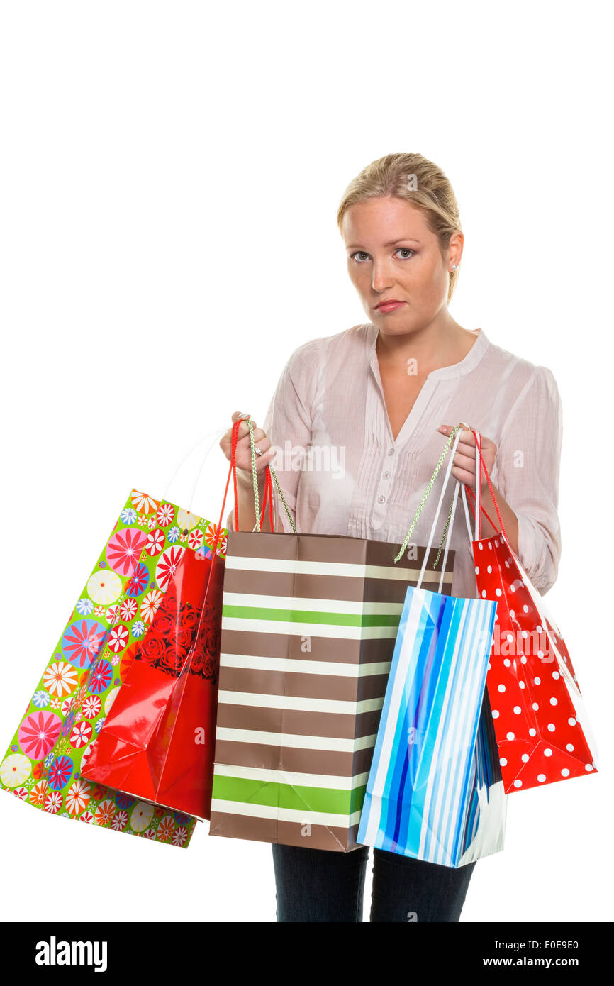 A young woman with carrier bags comes back from the shopping Stock ...