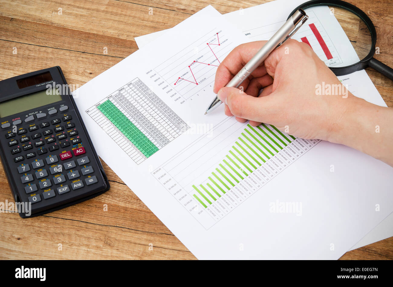 Magnifier on business background. Use for company strategic behavior ...