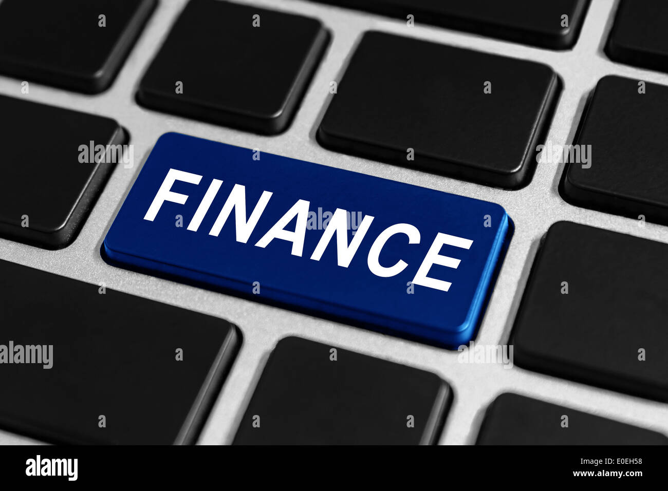 finance blue button on keyboard, business concept Stock Photo - Alamy