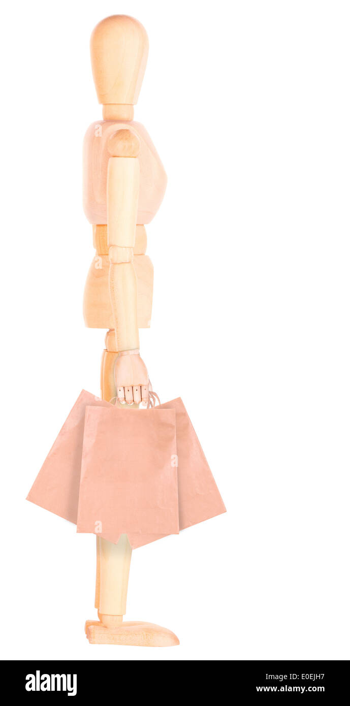 happy wooden Dummy with shopping bags isolated Stock Photo - Alamy
