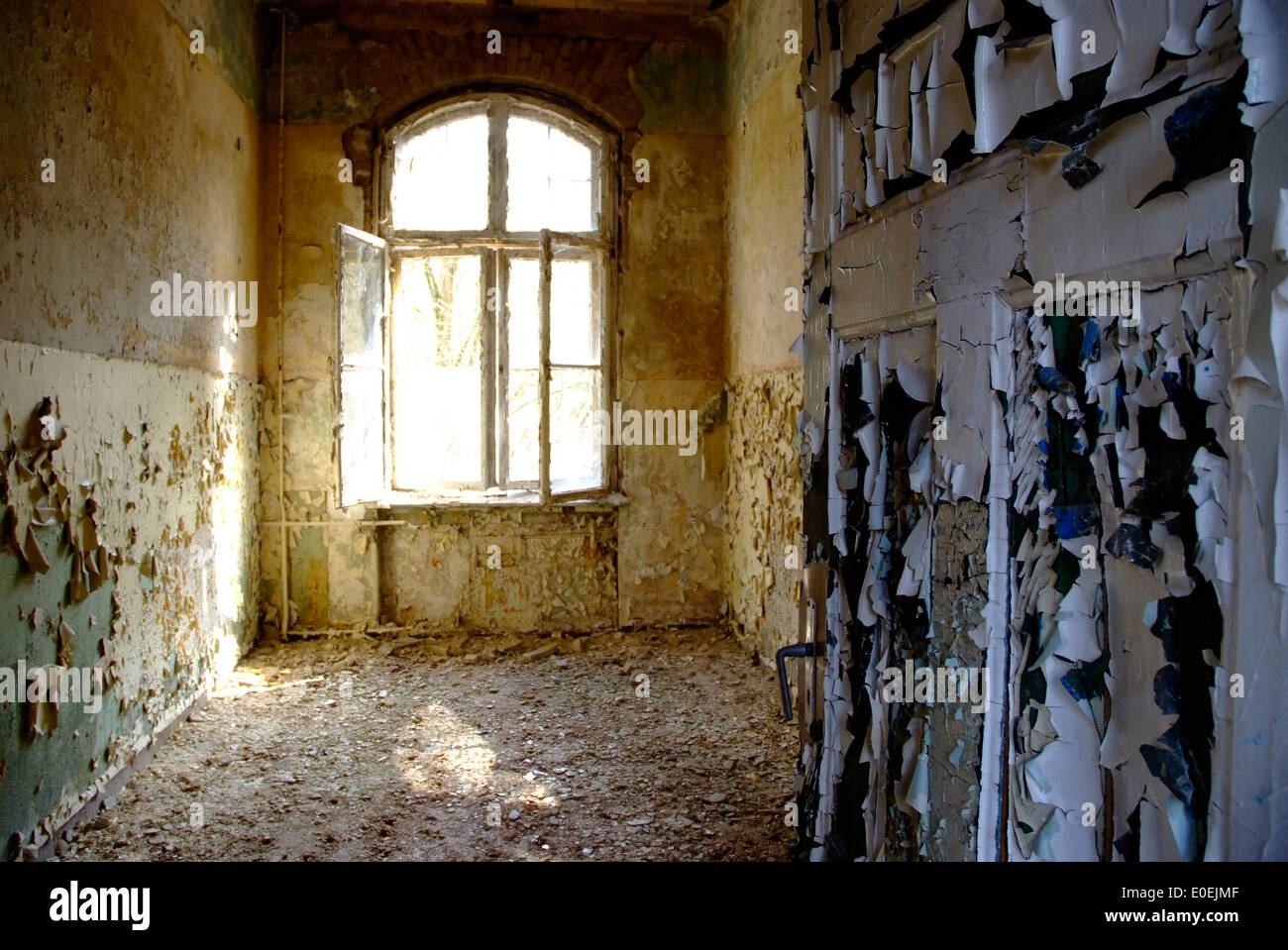 Room with window in a run-down building Stock Photo - Alamy