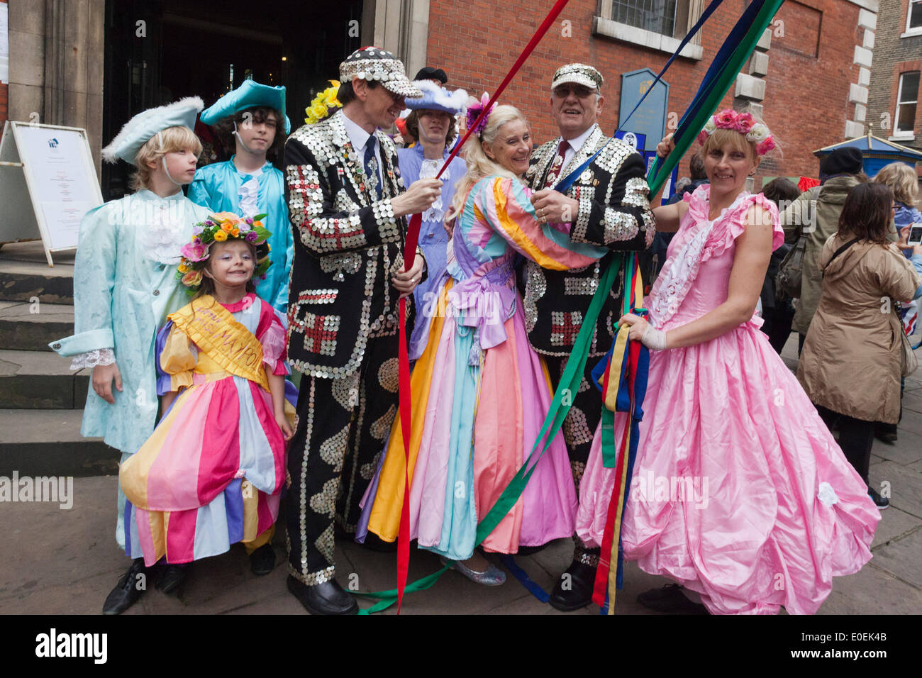 Covent Garden, London, UK. 11 May 2014. Costumed maypole dancers pose ...