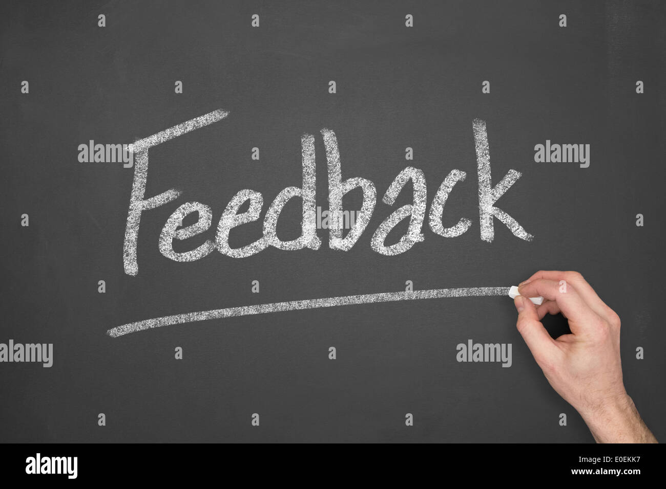 A hand writing Feedback on a chalkboard Stock Photo - Alamy
