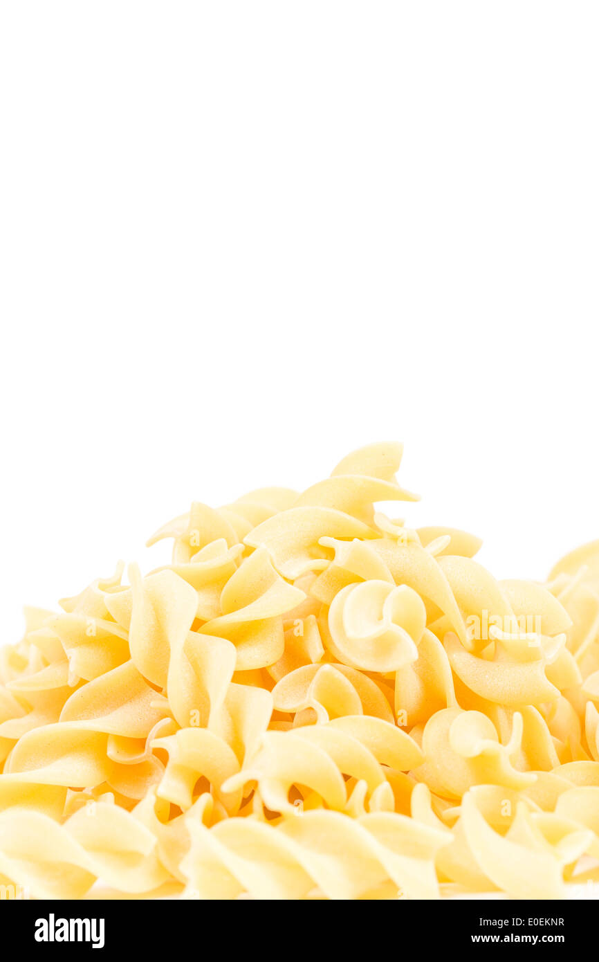 Three fusilli dry pasta isolated on white background Stock Photo - Alamy