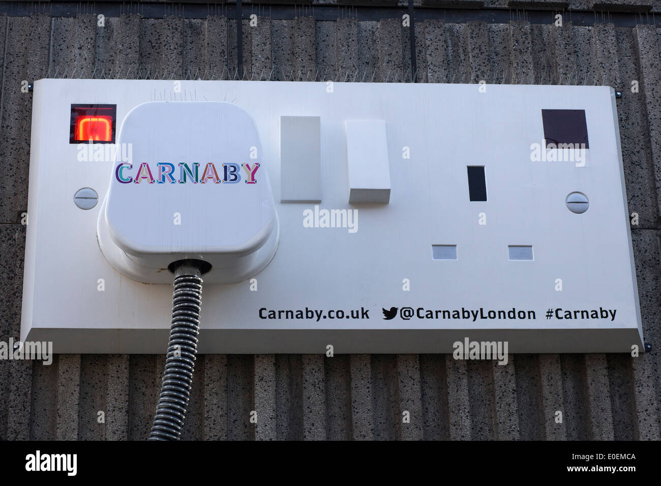 Giant wall socket and plug in Ganton street off London's Carnaby street ...