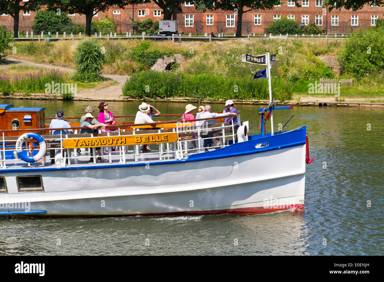 Boat passes Hampton Court on the River Thames in London England Stock ...