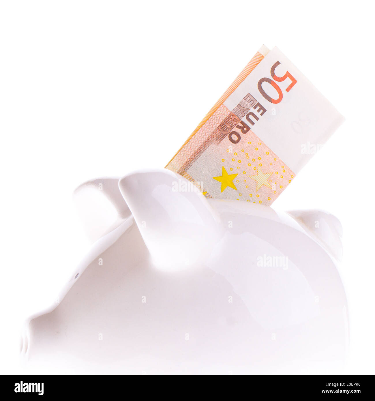 Saving fifty euro in a white money box Stock Photo - Alamy