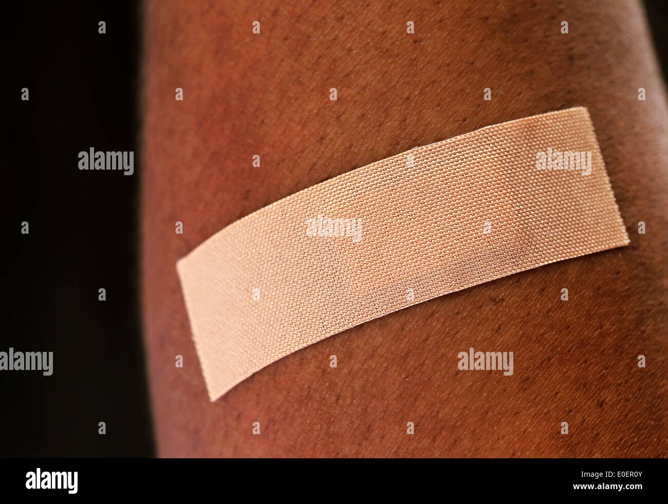 Close up of a plaster on human skin Stock Photo - Alamy