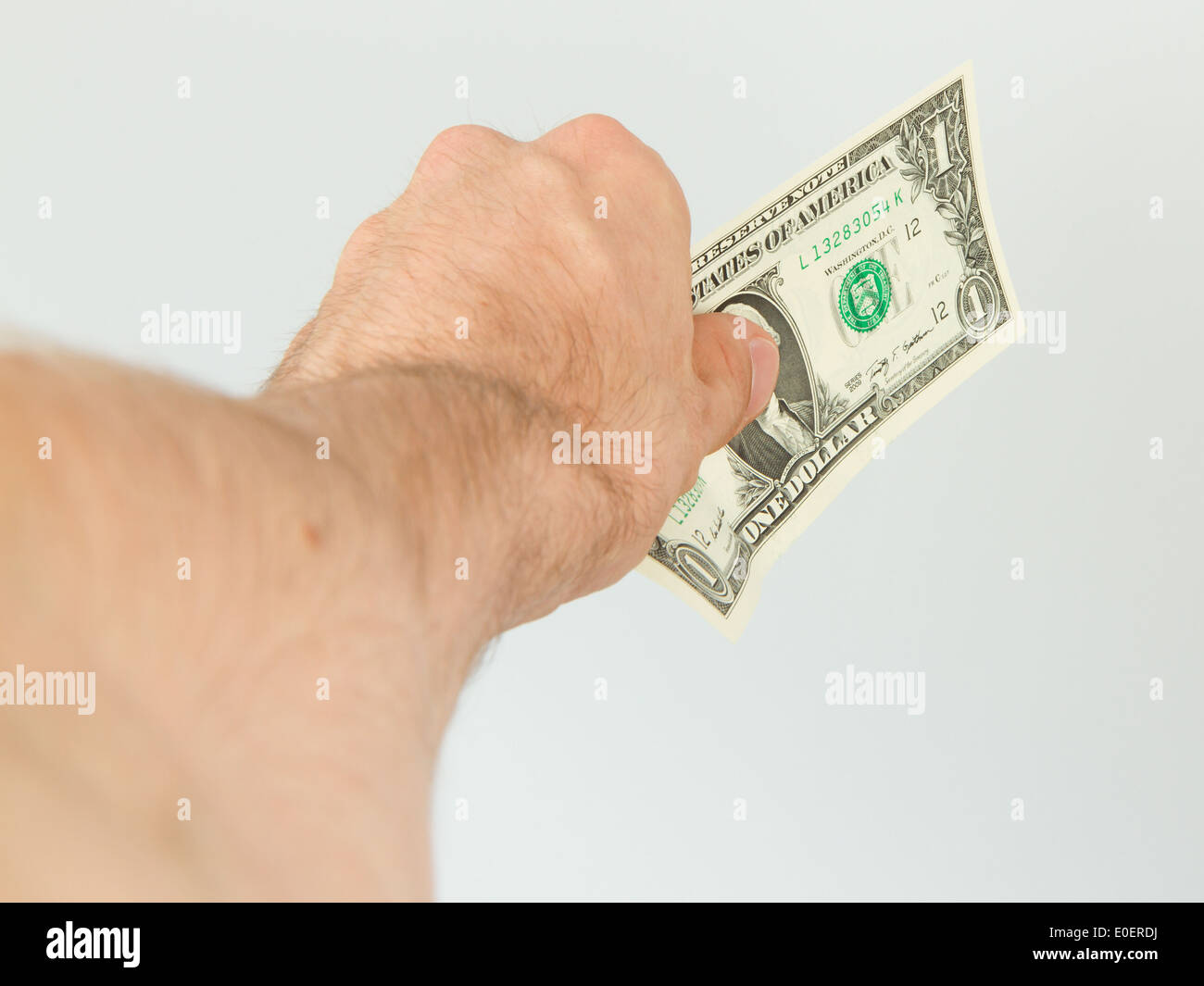 Man giving an one dollar bill, isolated on white Stock Photo - Alamy